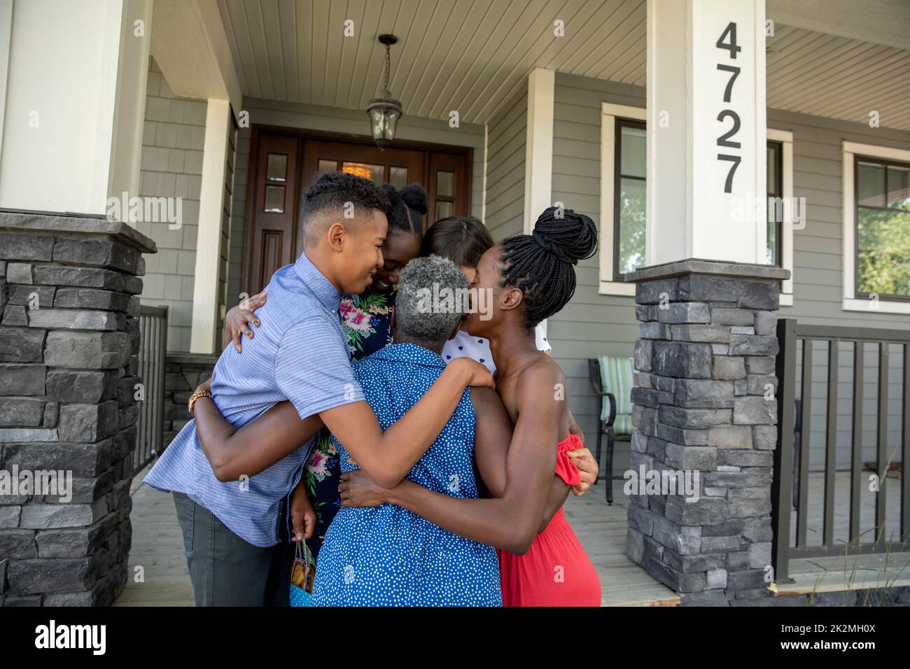 Family reunion hug hi-res stock photography and images - Alamy