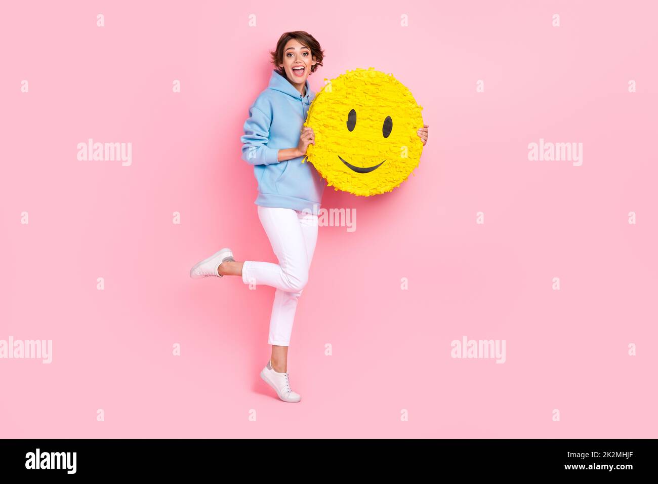 Full body portrait of crazy funky lady hand arm hold yellow smile ...