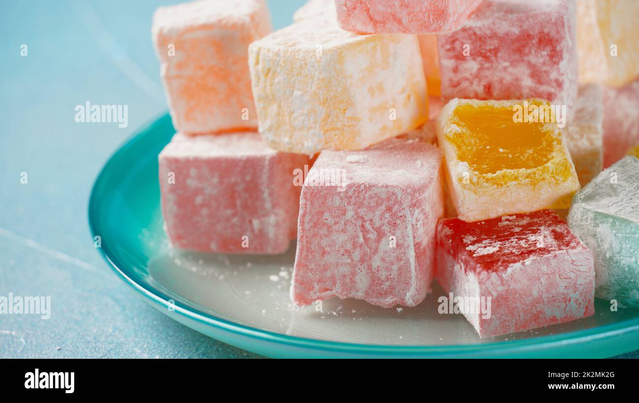 Assorted Turkish delights Rahat lokum. Colorful cubes of Turkish ...