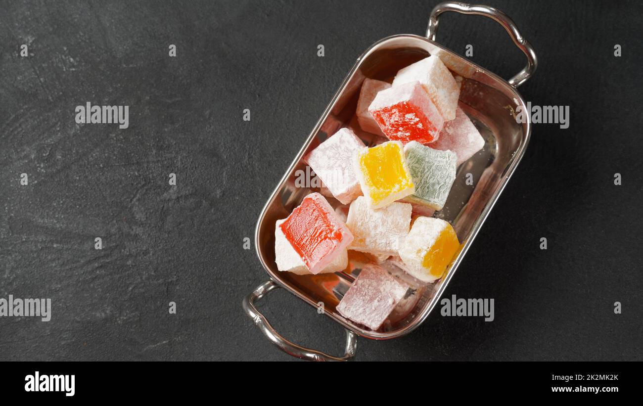 Assorted Turkish delights Rahat lokum. Colorful cubes of Turkish ...
