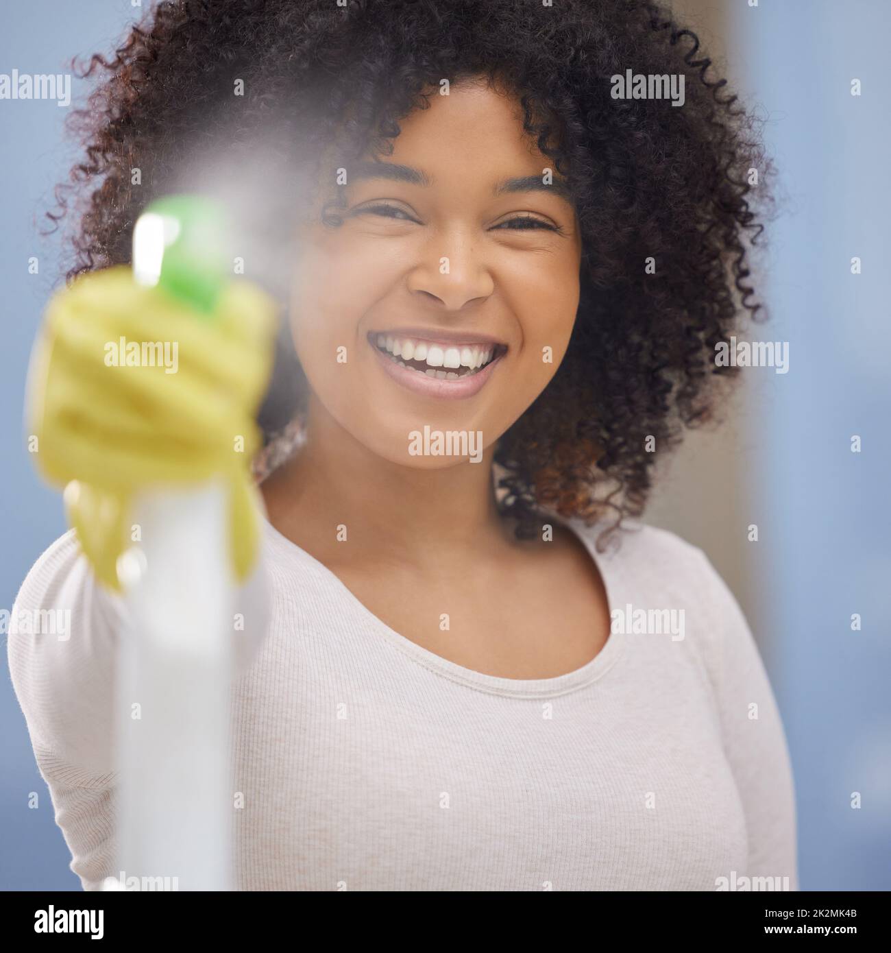 Goodbye fingerprints. Shot of an attractive young woman standing alone ...