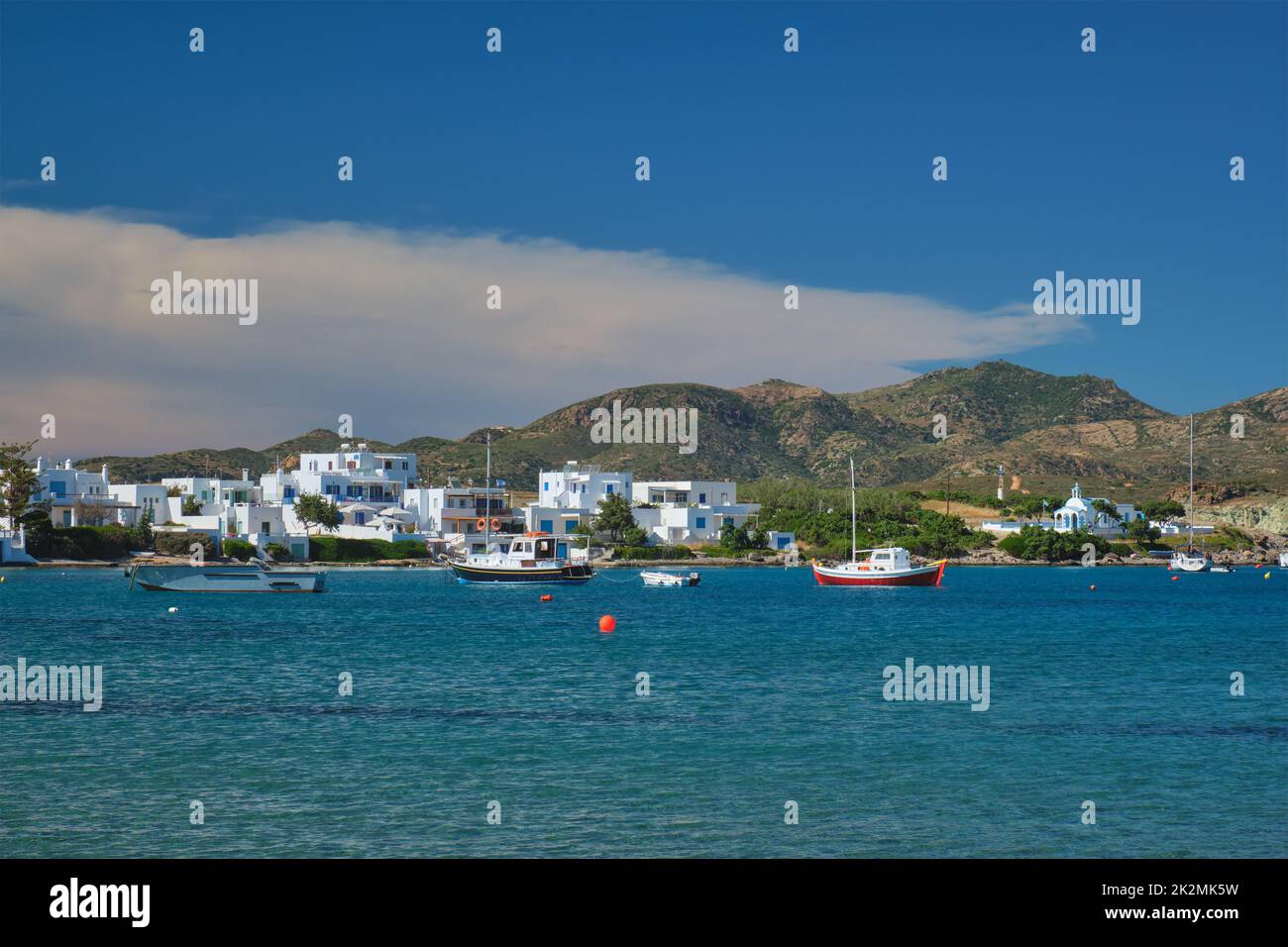 The beach and fishing village of Pollonia in Milos, Greece Stock Photo ...