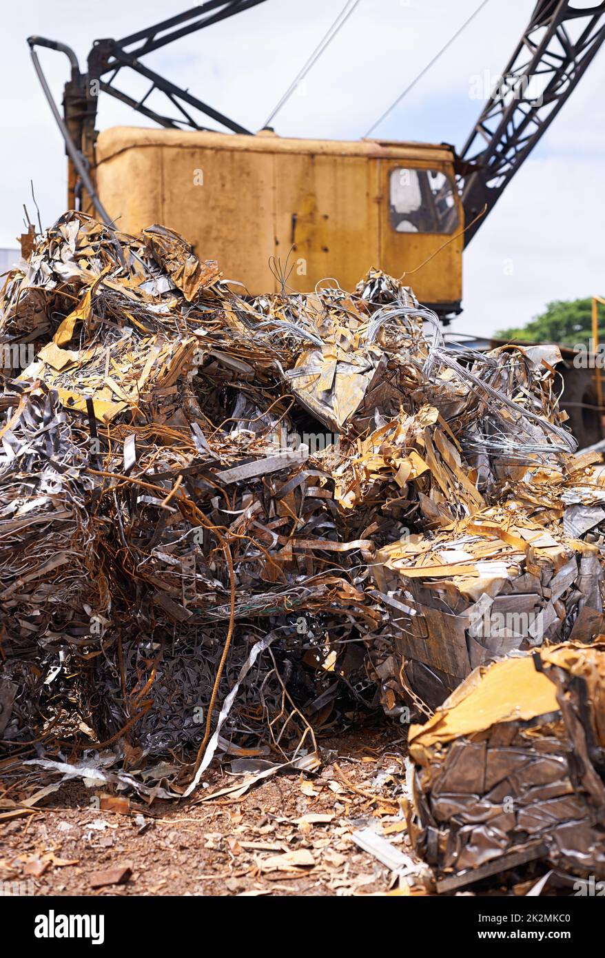 Pile of scrap metal with a crane hi-res stock photography and images ...