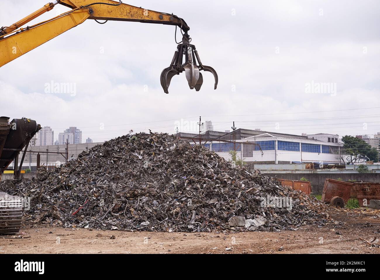 In the business of metal. Cropped shot of an excavator sorting through ...