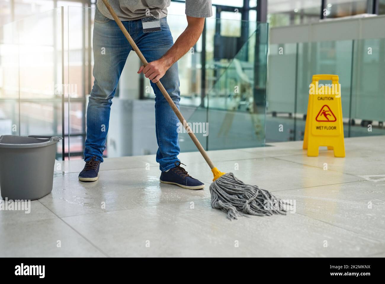 Janitor mopping office hi-res stock photography and images - Alamy