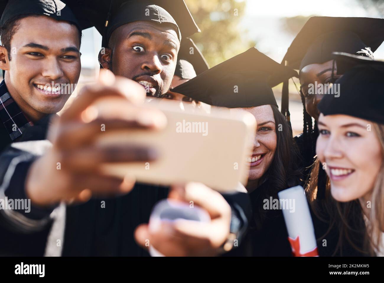 The fireworks begin today. Shot of a group of students taking selfies ...