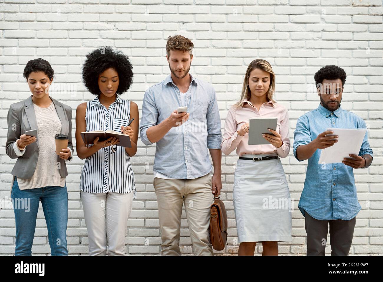Social networking to get the companies name out there. Shot of young ...