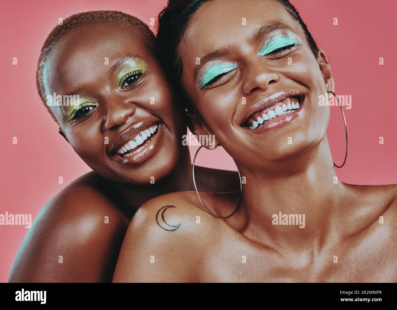 We look good with or without makeup. Shot of two beautiful young women ...