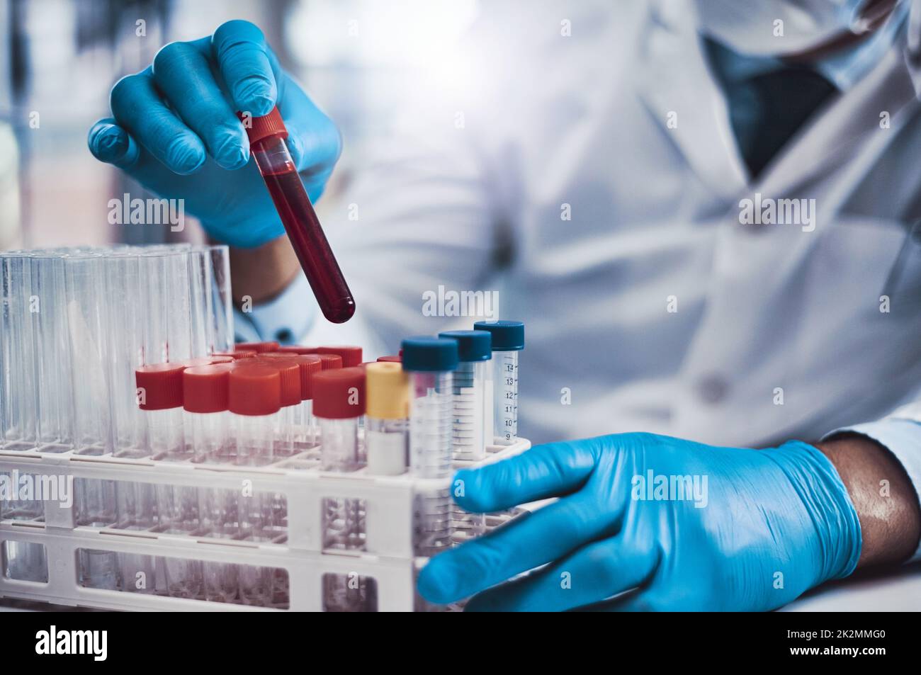 Time for sampling. Cropped shot of an unrecognizable scientist working ...