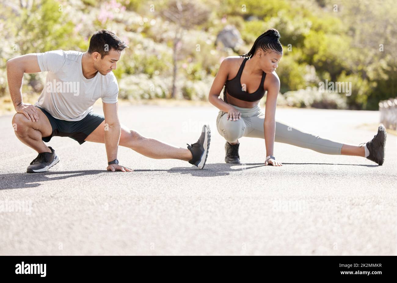 Fitness, nature and couple doing a stretching exercise before an ...