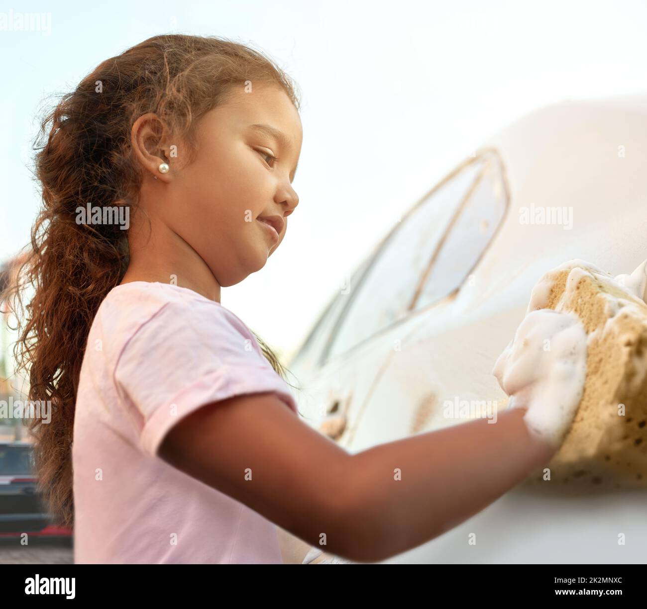 Kids helping with chores hi-res stock photography and images - Alamy