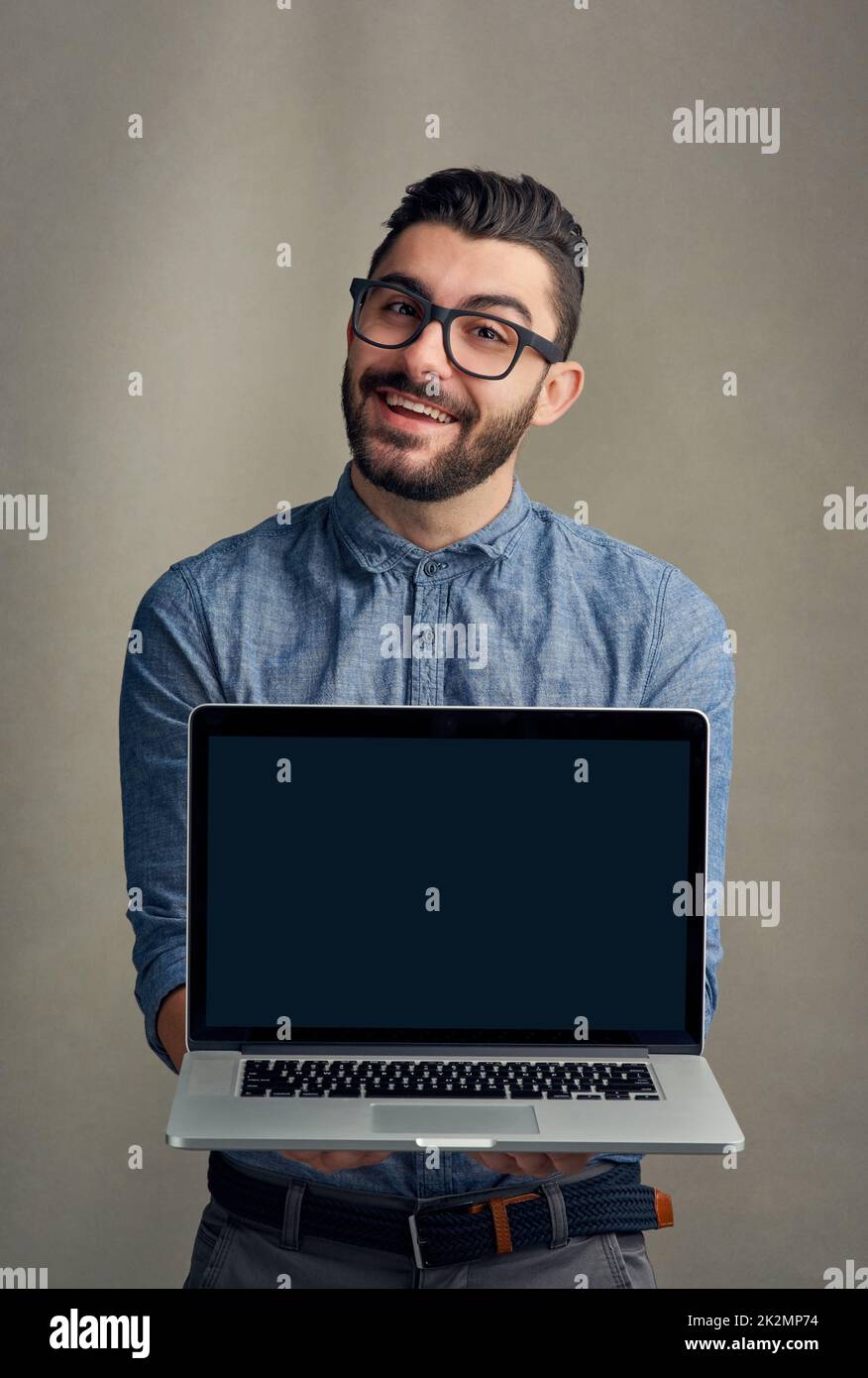 Your business website would look great here. Studio portrait of a young ...