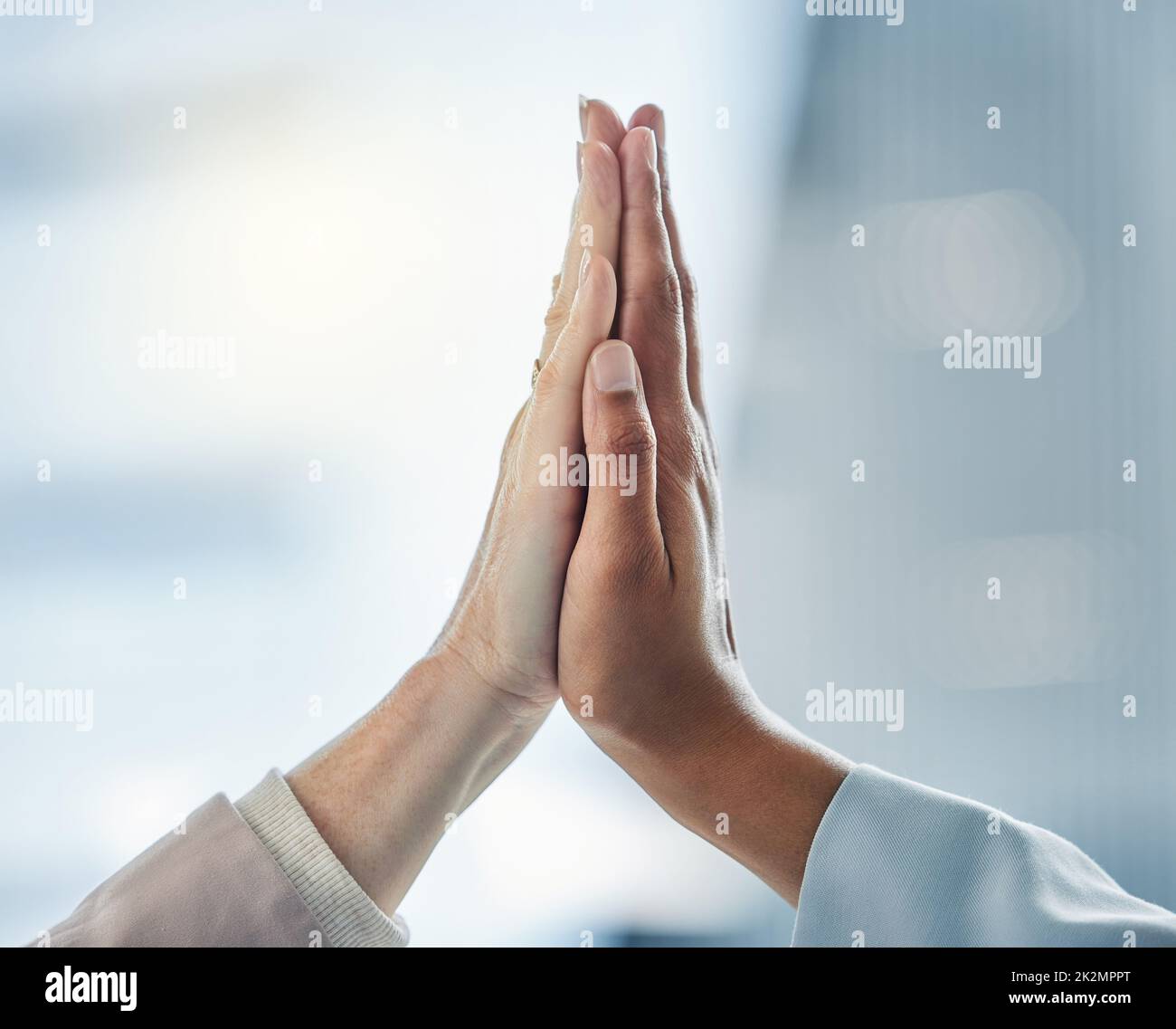 High fiving each other hi-res stock photography and images - Alamy