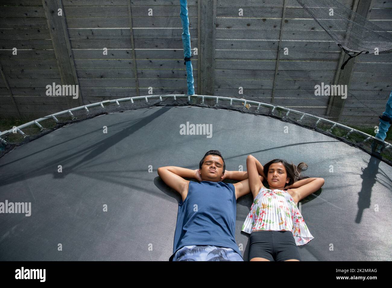 Boy preteen trampoline hi-res stock photography and images - Alamy
