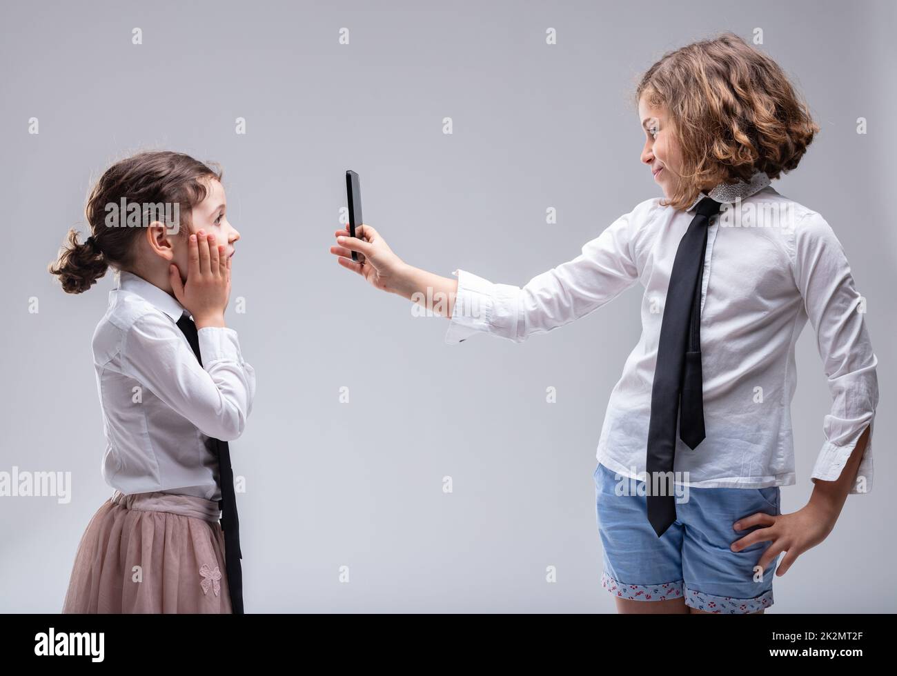 Young girl reacting in embarrassment Stock Photo - Alamy