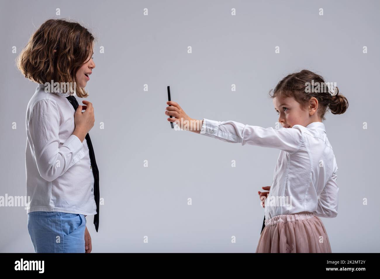 Sister face face hi-res stock photography and images - Alamy