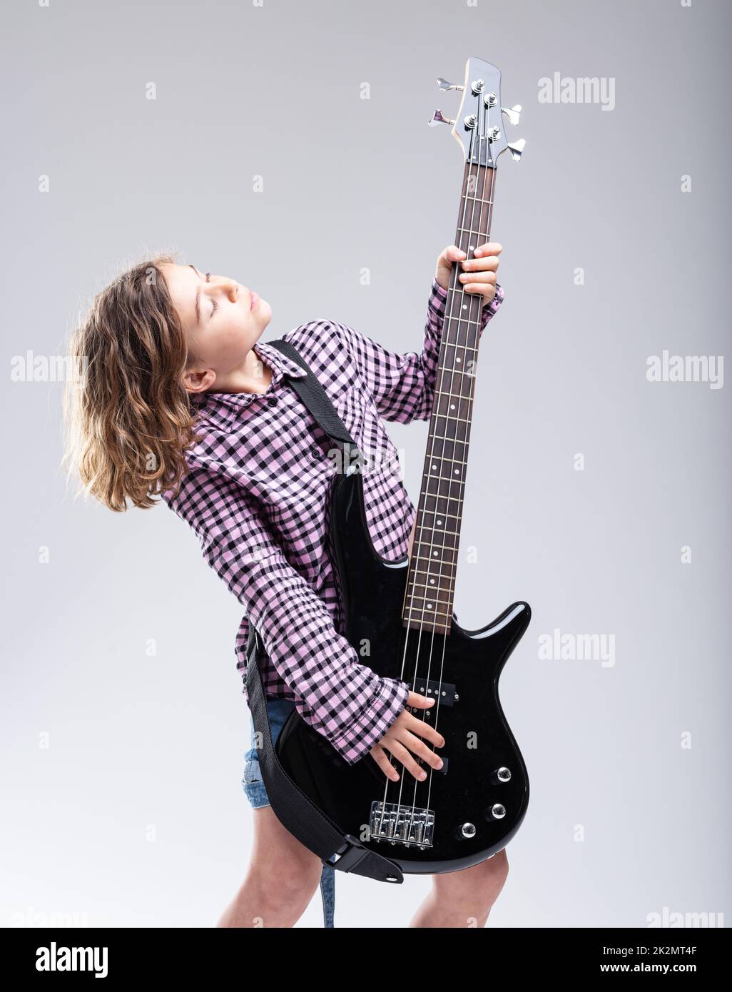 Talented young girl with a gift for guitar music Stock Photo - Alamy
