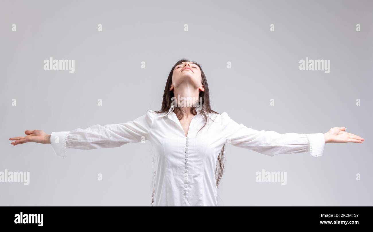 Young woman enjoying a moment of peace Stock Photo - Alamy