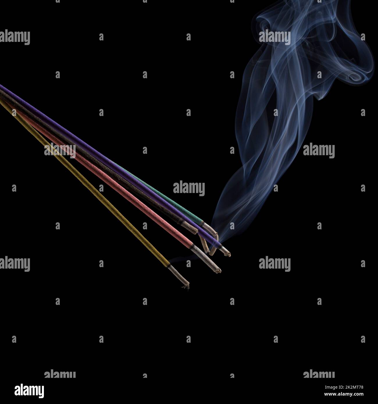Incense sticks on black Stock Photo - Alamy
