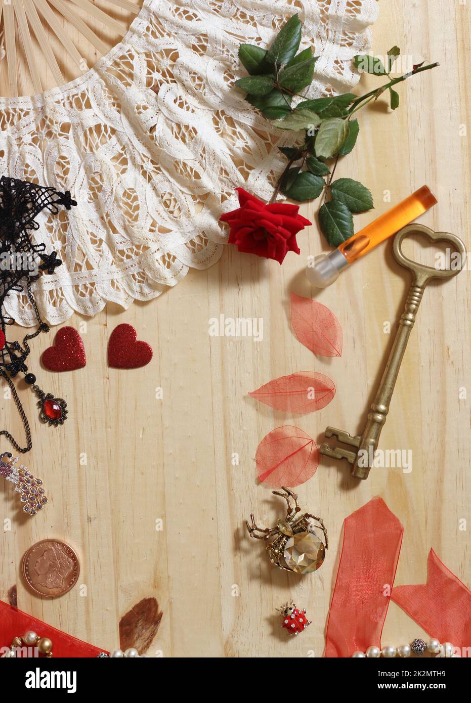 Vintage Brass Key With Lace Fan and Red Rose Stock Photo - Alamy