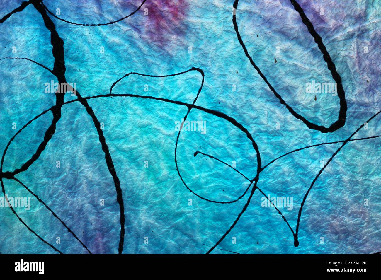 Antique Blue Glass With Black Paint Splashed on surface and Light ...