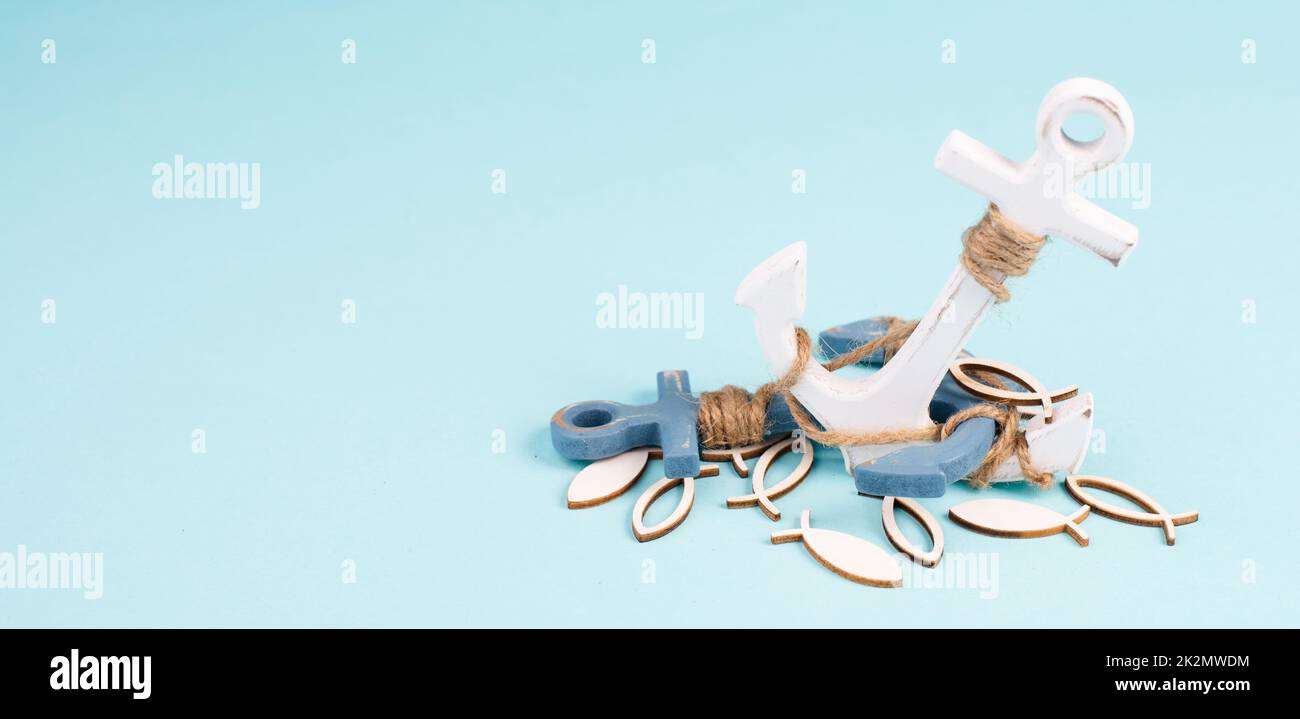 White anchor and fish on a blue background, maritime sea life, sailing ...