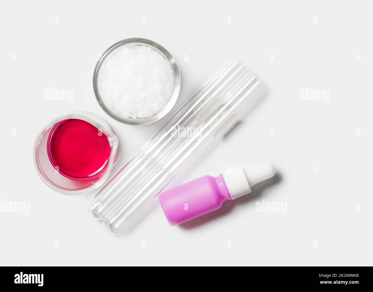 Test tube and serum bottle with dropper placed next to Potassium ...