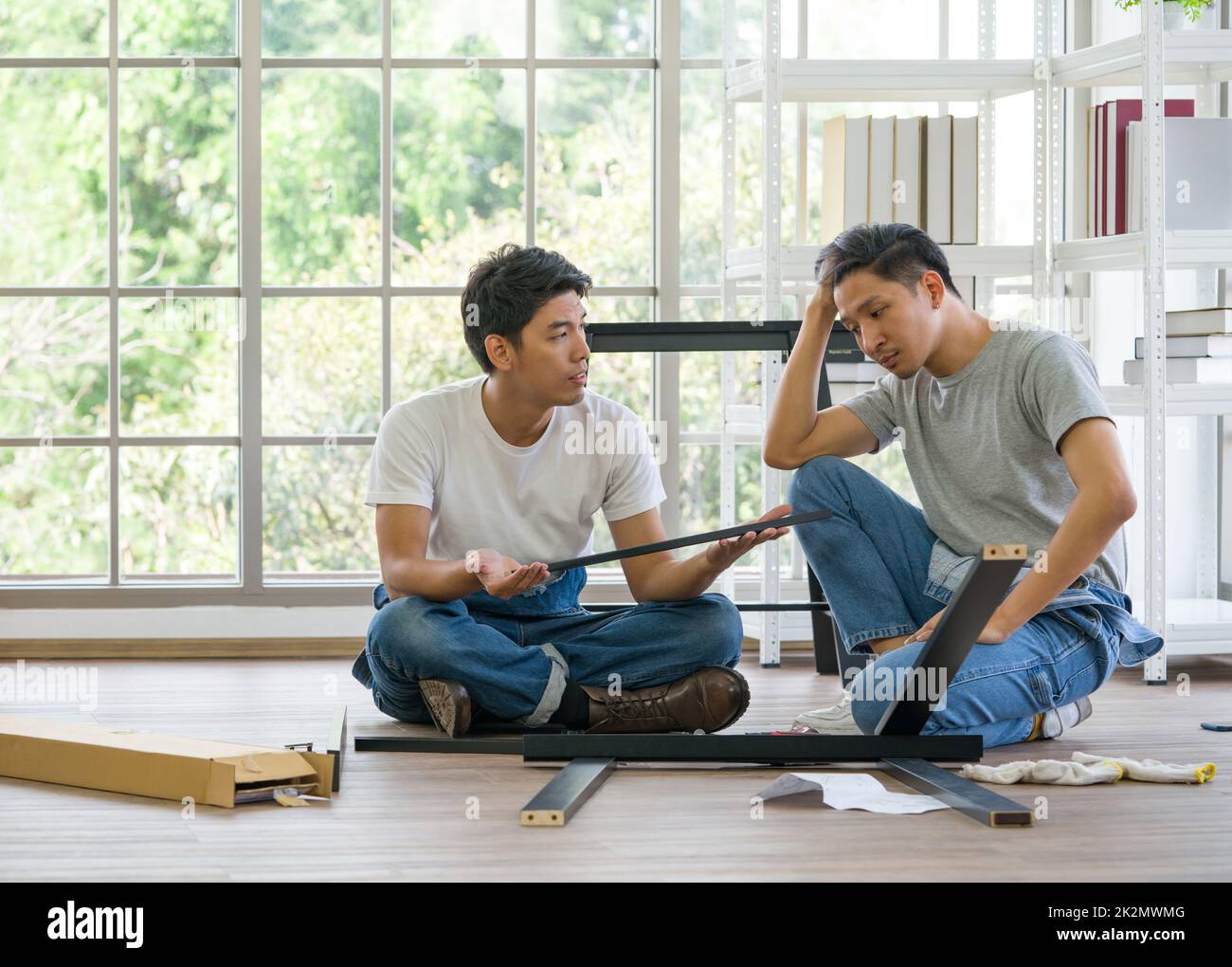 House renovation service. Two carpenters discussed the type of bench ...