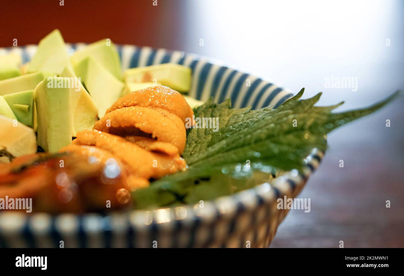Premium fresh food mixed rice bowl. Japanese rice with Uni, Foie Gras ...