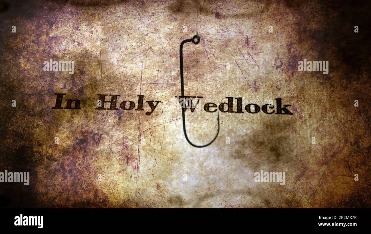 Fish hook against holy wedlock bait concept Stock Photo - Alamy