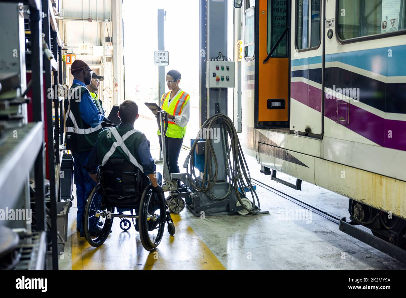 Transit supervisor and engineers meeting in maintenance facility Stock ...