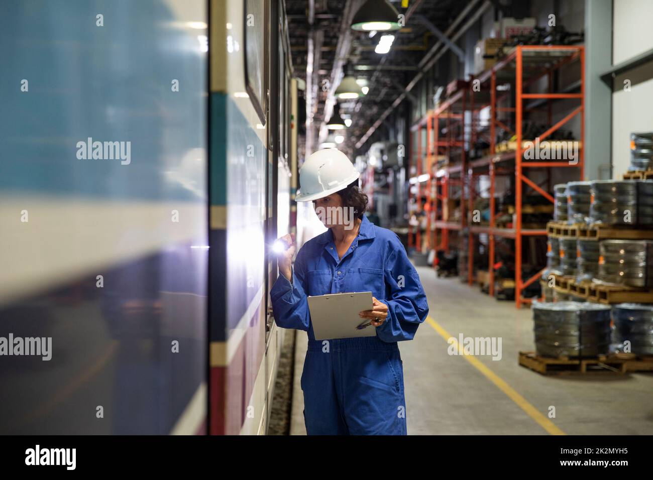 Car engineer holding a part hi-res stock photography and images - Alamy