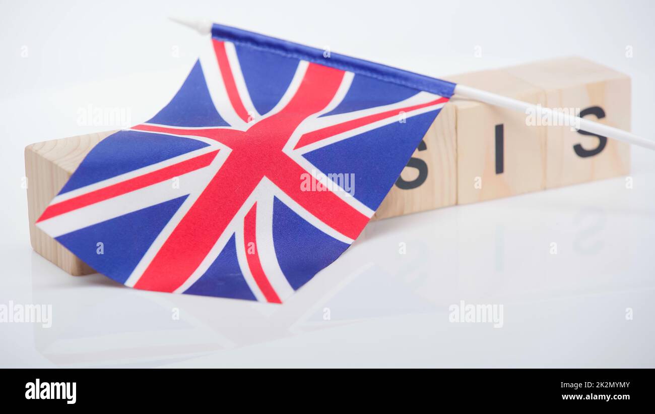 British flag on wooden cubes with crisis lettering on white background ...