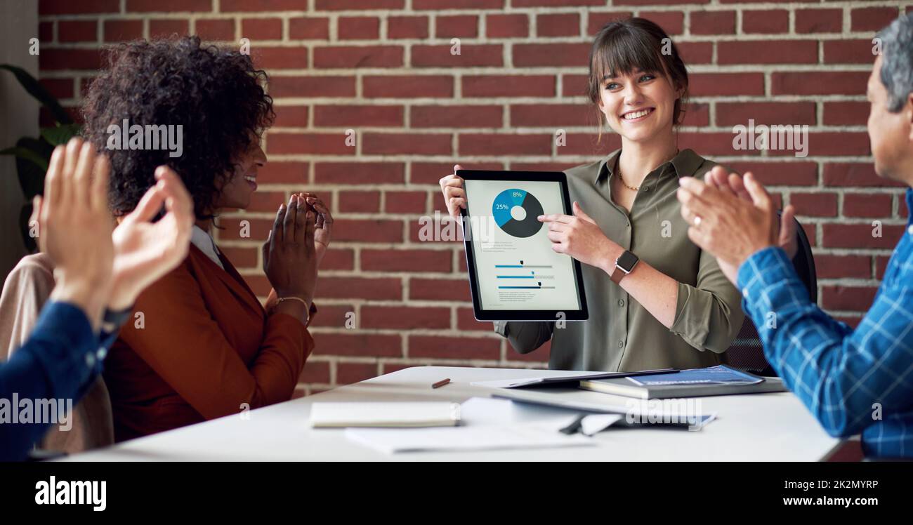happy business woman using digital tablet computer presenting financial ...