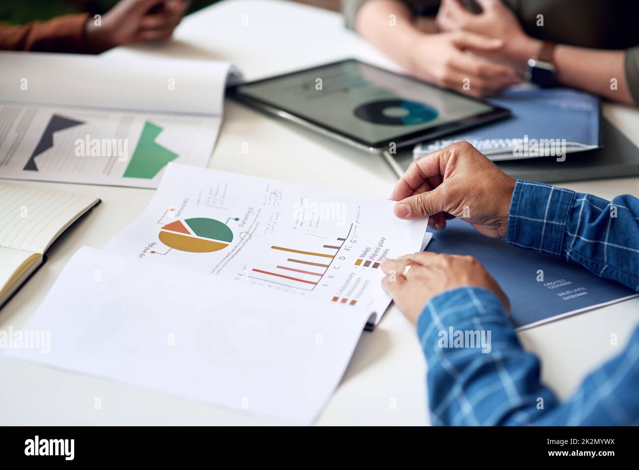businessman hands holding financial document discussing data with ...