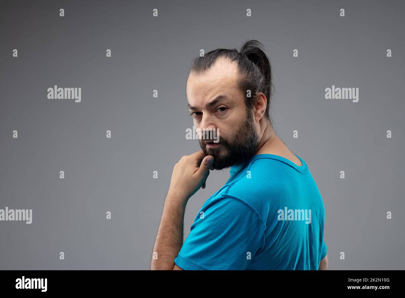 Looking back at camera hi-res stock photography and images - Alamy