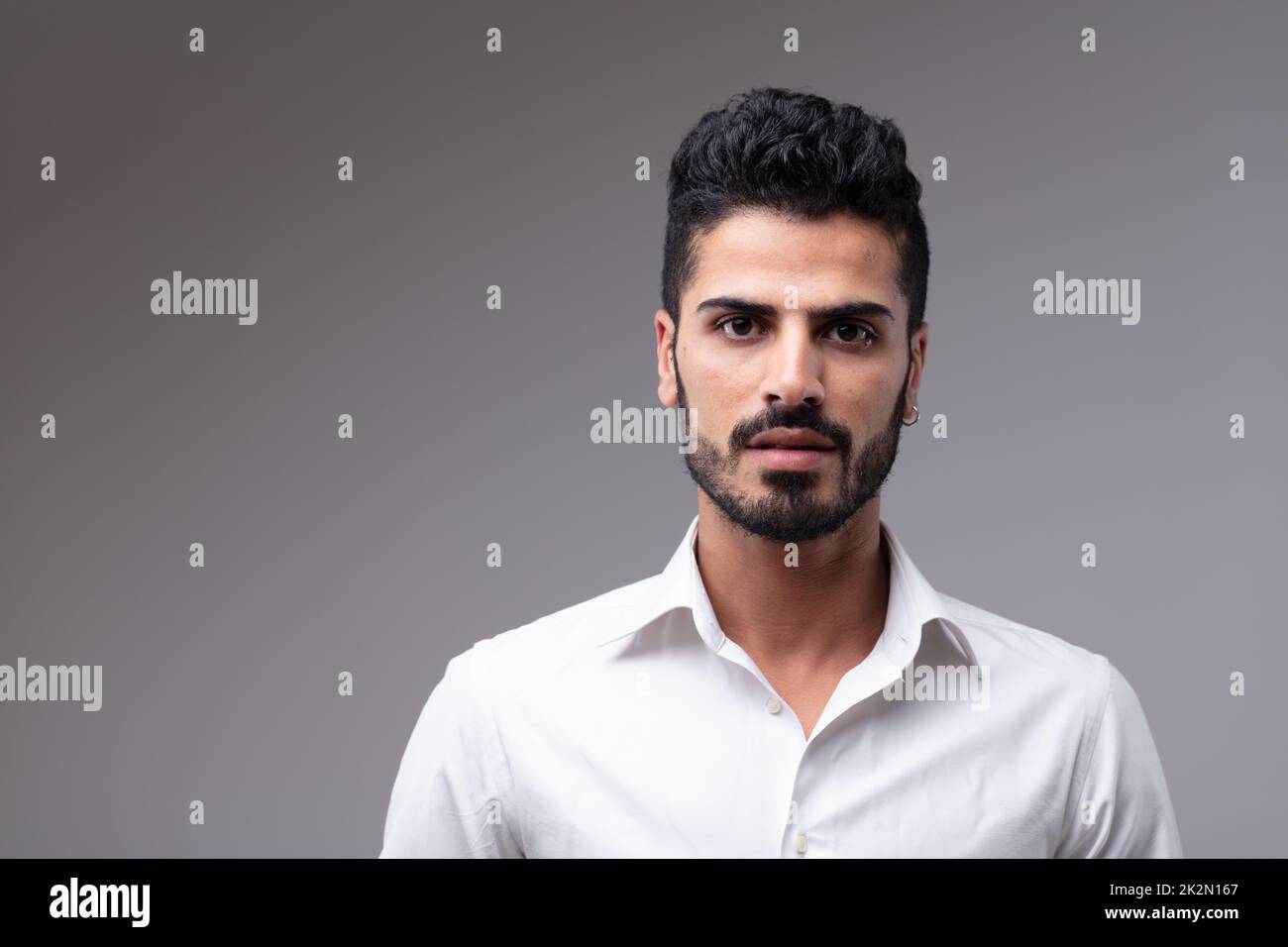Young attractive man wearing hi-res stock photography and images - Alamy