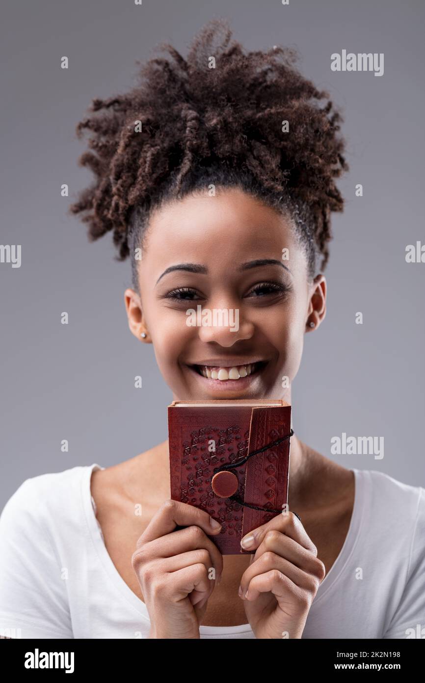 Vivacious happy young woman with a beaming smile Stock Photo - Alamy
