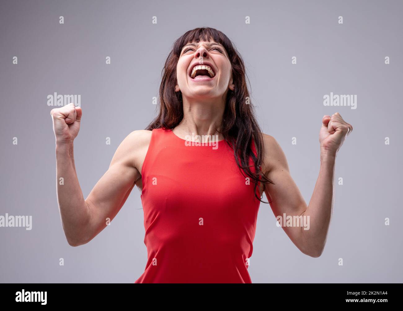 Excited celebrating hi-res stock photography and images - Alamy