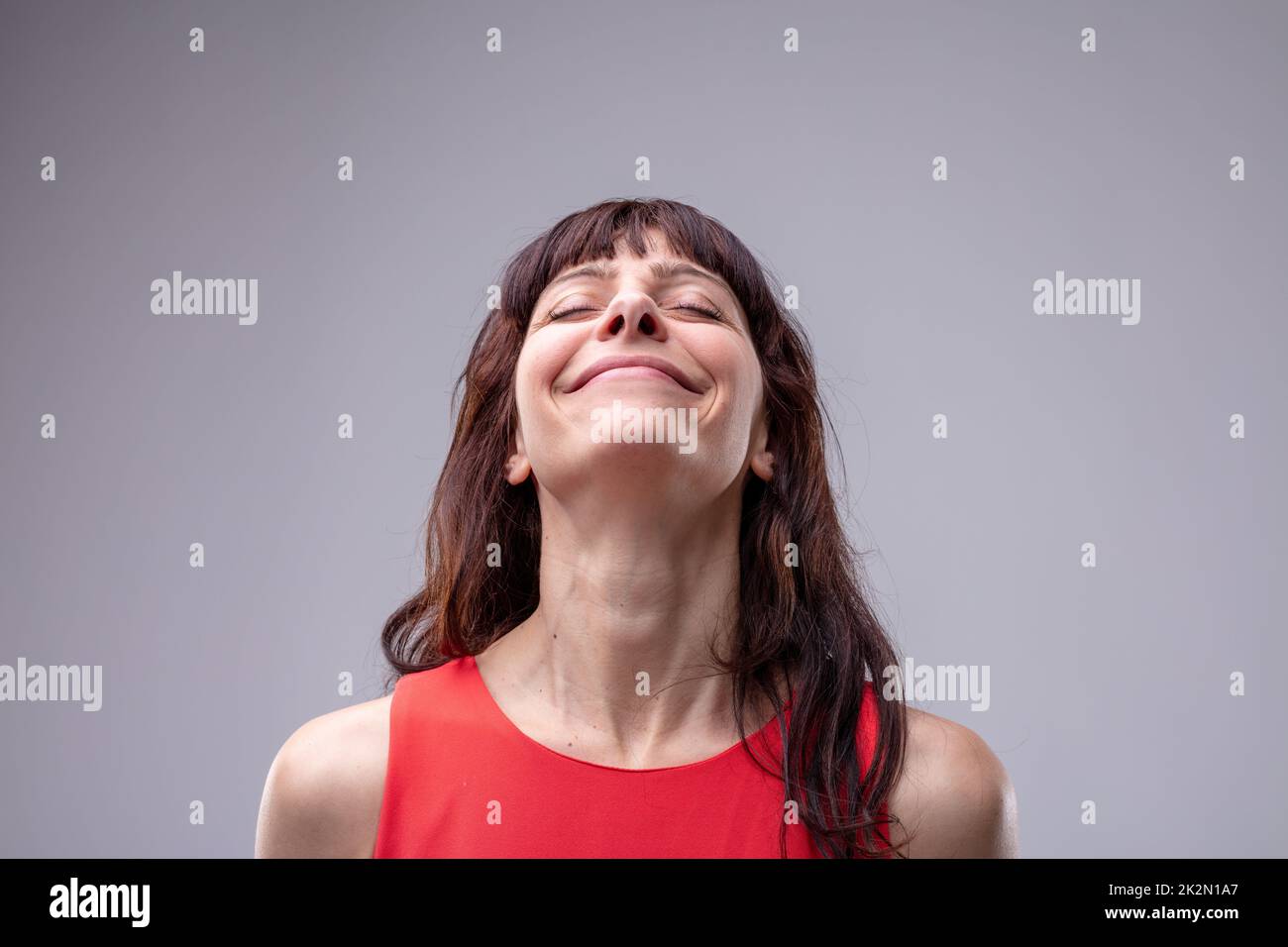 Woman head thrown back hi-res stock photography and images - Alamy