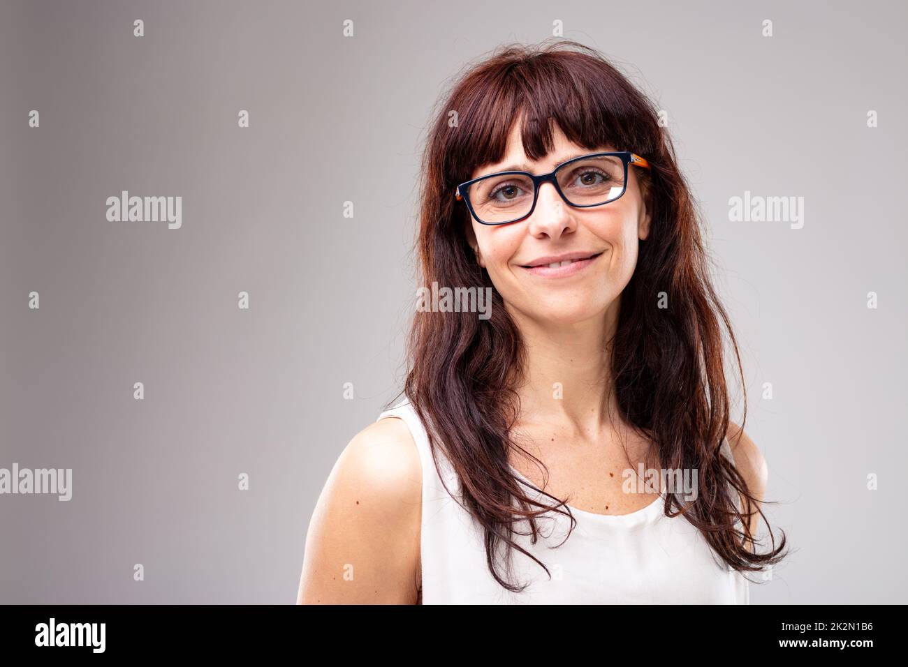 Woman wearing glasses hi-res stock photography and images - Alamy