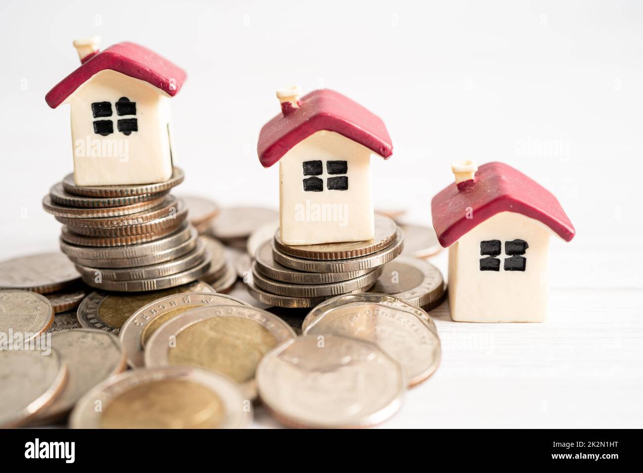 House on stack coins, mortgage home loan finance concept Stock Photo ...