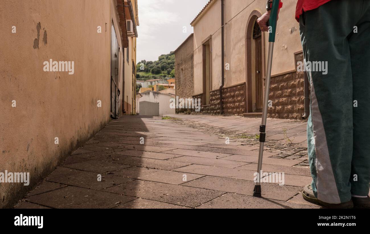 elderly man falling on crutches from the stairs in the house, losing ...