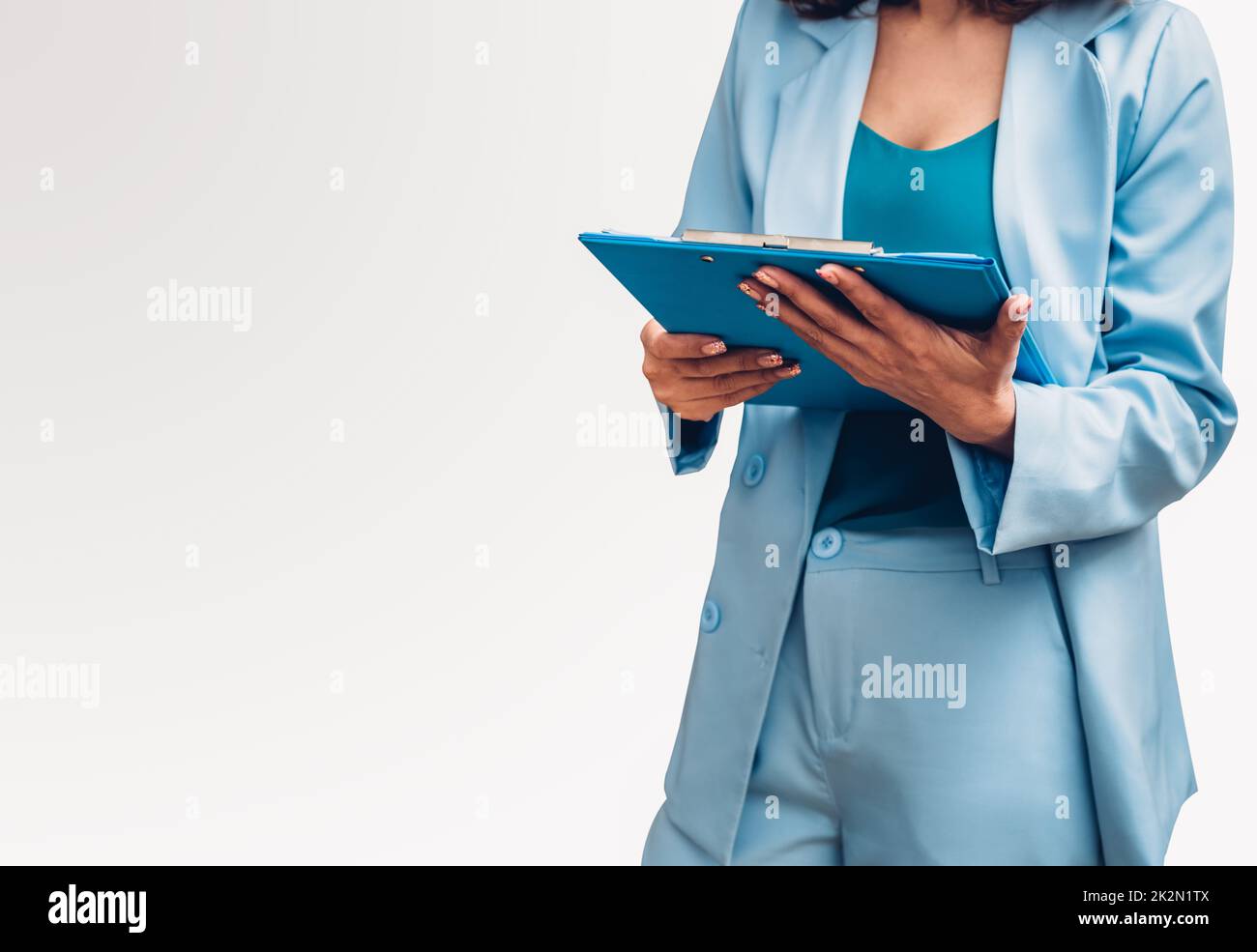 Young business woman her holding file document Stock Photo - Alamy