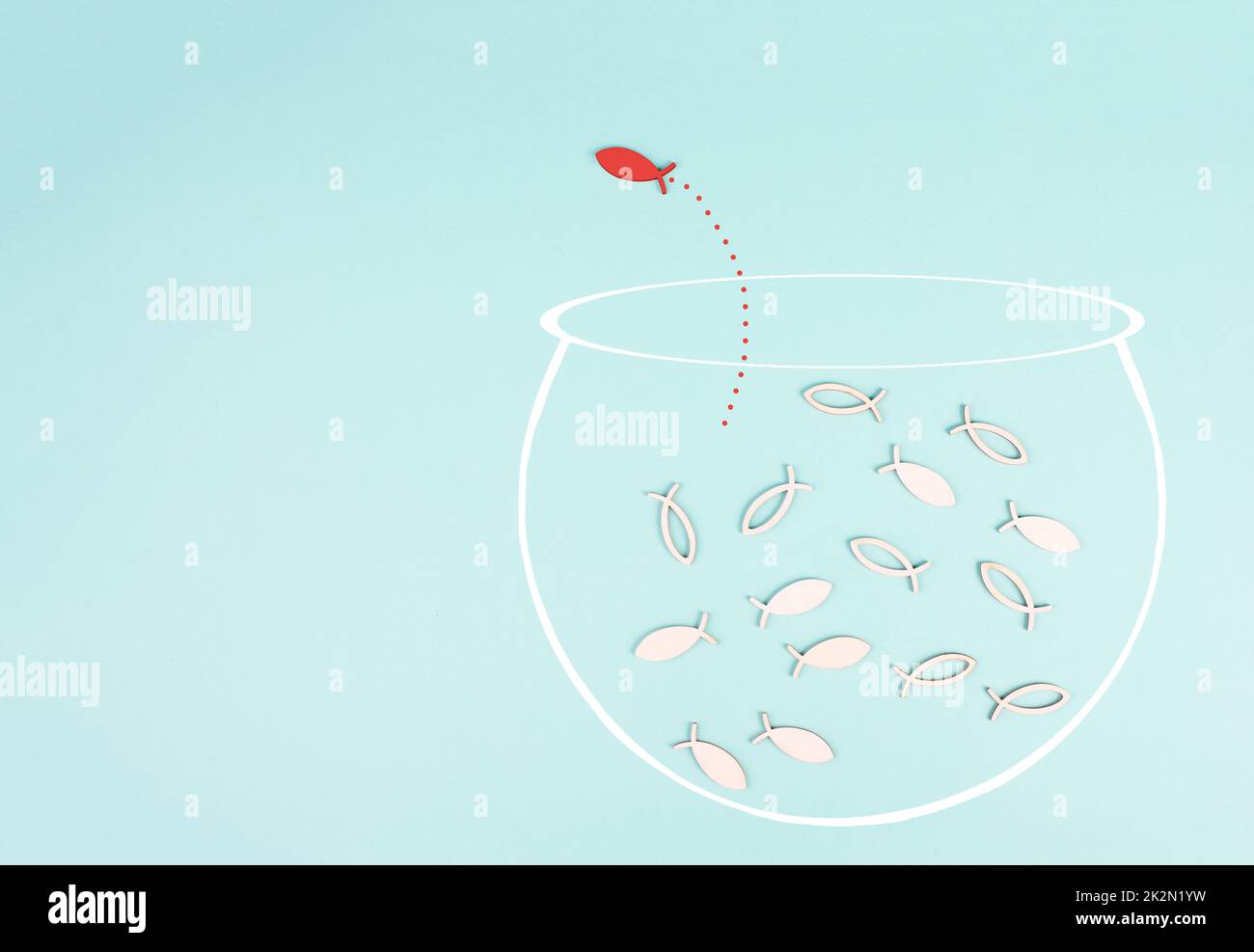 One fish is the leader of the group, leadership and teamwork concept ...