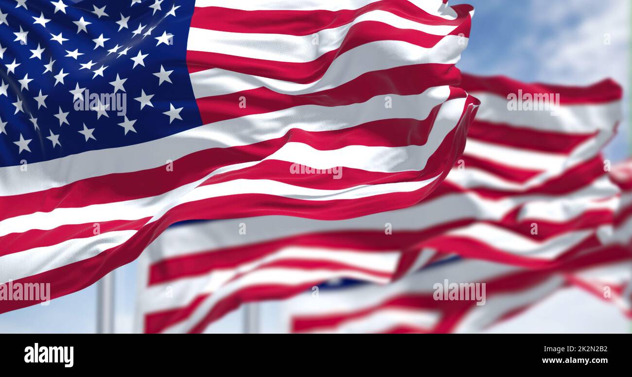 Three flags of the United States of America waving in the wind Stock ...