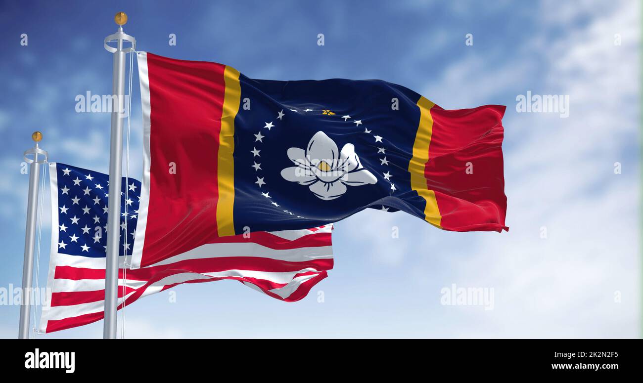 The Mississippi state flag waving along with the national flag of the ...