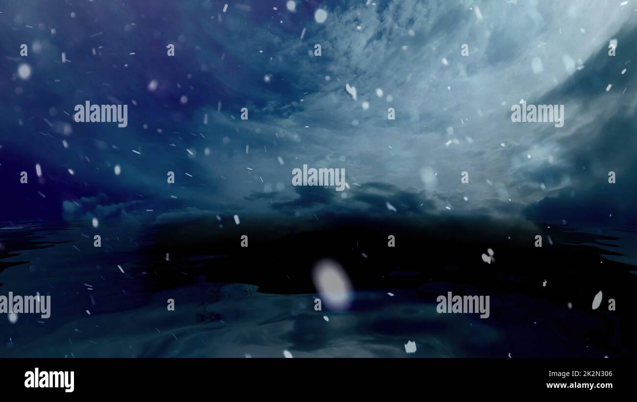 Snowing on Stormy Clouds Over Dark Ocean Stock Photo - Alamy