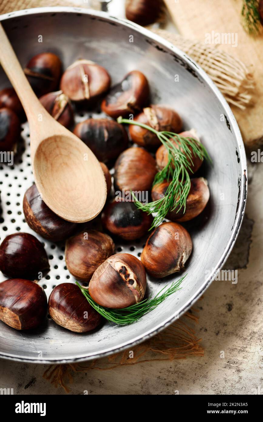 Traditional roasted chestnut hi-res stock photography and images - Alamy