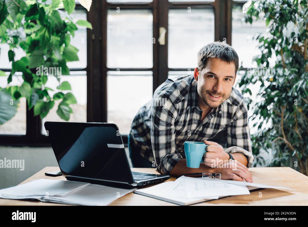 Man in modern office Stock Photo - Alamy